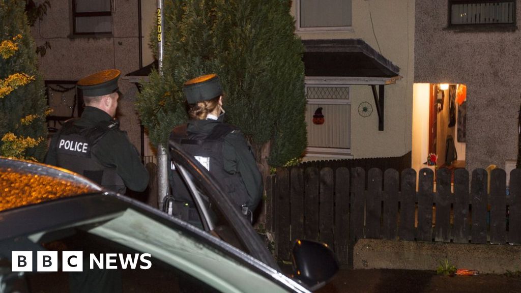 Newry man shot 'answering front door' - BBC News