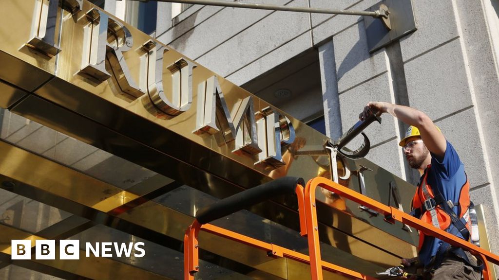 Trump's name removed from NYC buildings - BBC News