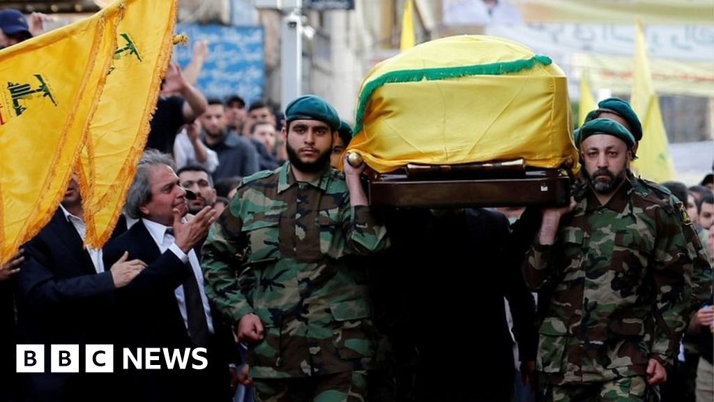 Thousands mourn Hezbollah commander at Beirut funeral - BBC News