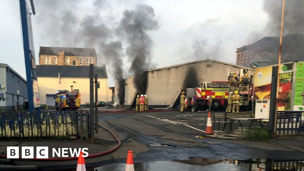 Up to 50 cars destroyed in Glasgow garage fire - BBC News