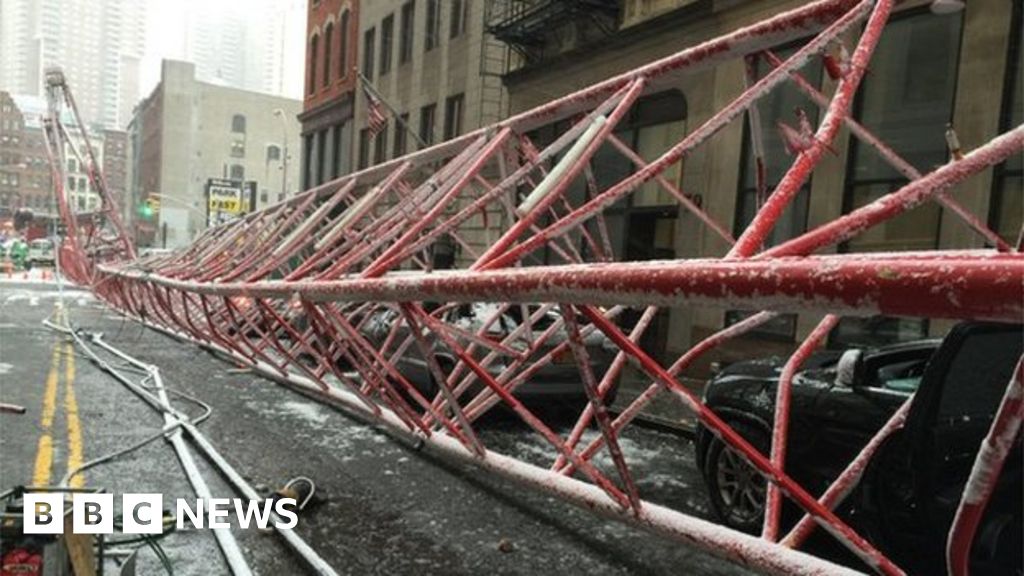 New York crane collapse kills at least one person - BBC News