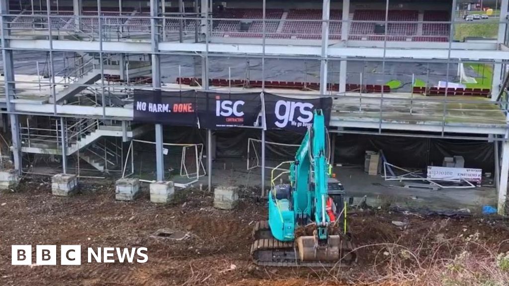 Work restarts on long-awaited Northampton Town East Stand - BBC News