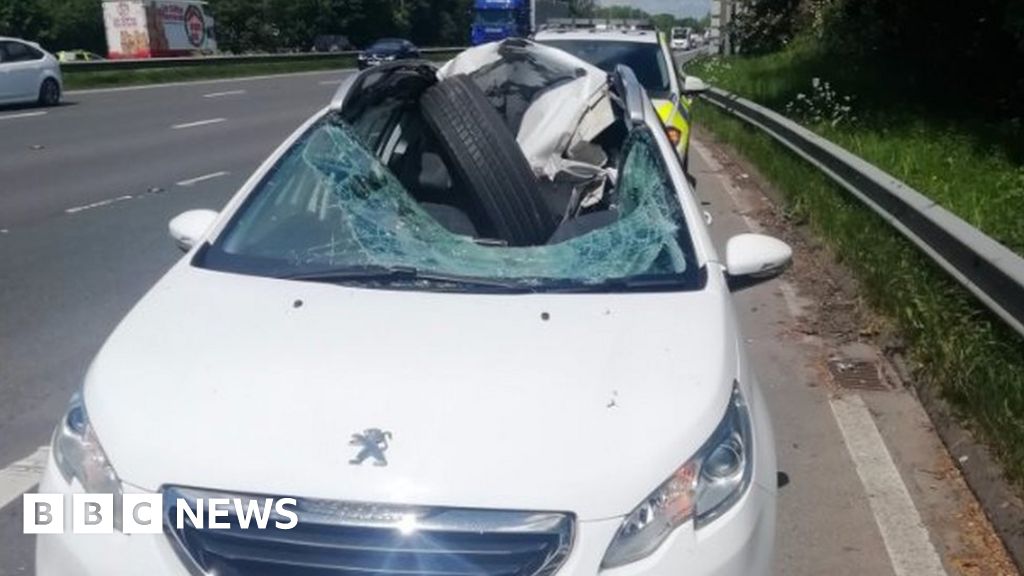 Loose lorry wheel smashes into car on M6 in Leyland - BBC News