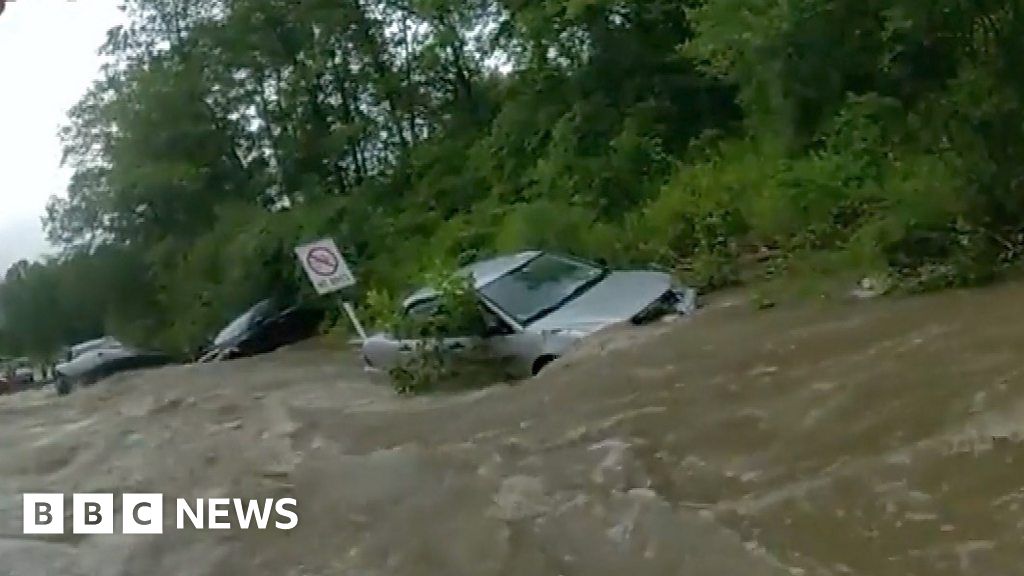 Dramatic rescue captured as deadly floods sweep north-east - BBC News