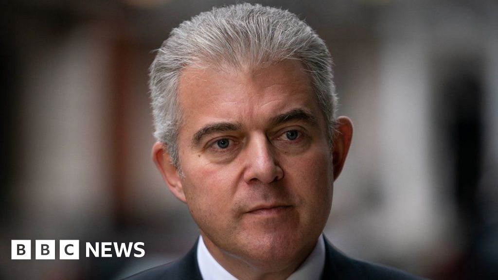 Legacy: Law firm launches defamation case against Brandon Lewis - BBC News