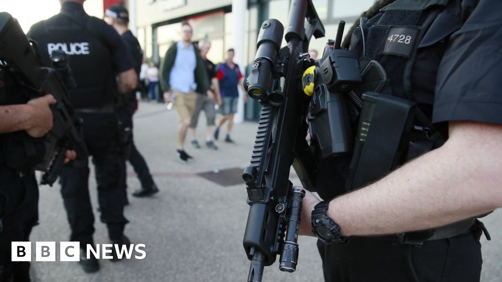 Manchester attack: Armed police guard bank holiday events - BBC News