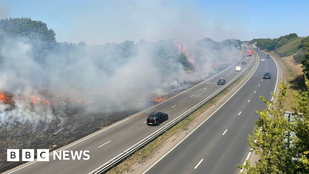 A30: Fire breaks out next to dual carriageway - BBC News