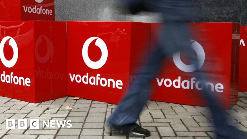 Vodafone reports hefty loss after hit from Indian unit - BBC News