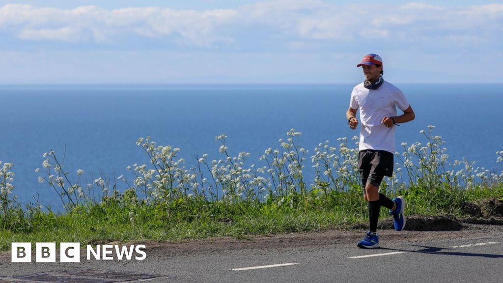 Man completes 200 marathons in 128 days around Britain's coast - BBC News