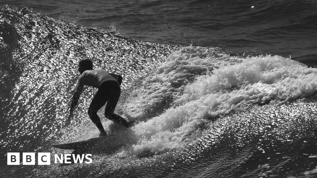 In pictures: Daredevils make waves in Sydney despite deadly storms ...
