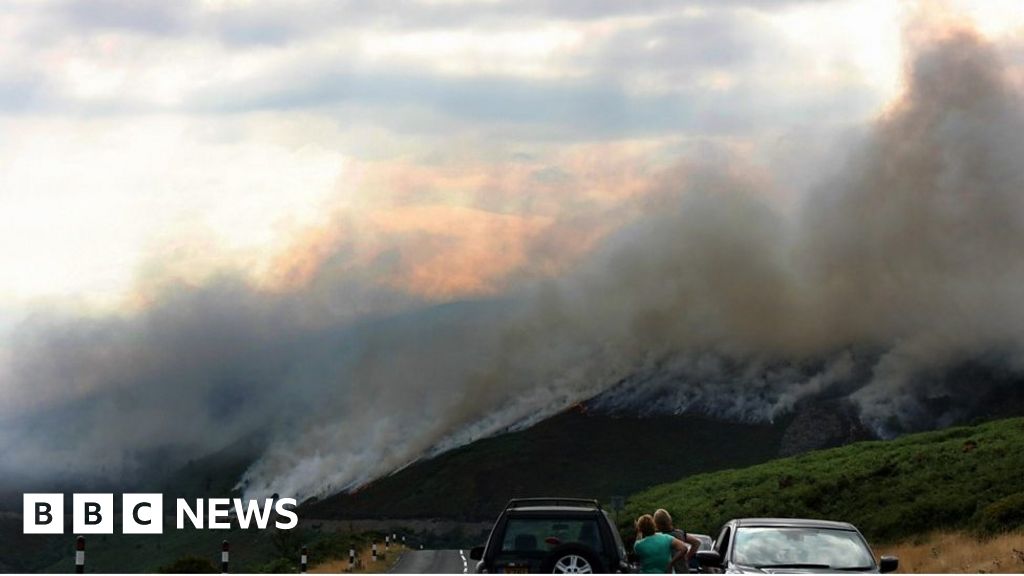 Fire at Llantysilio near Llangollen burning for almost a month - BBC News