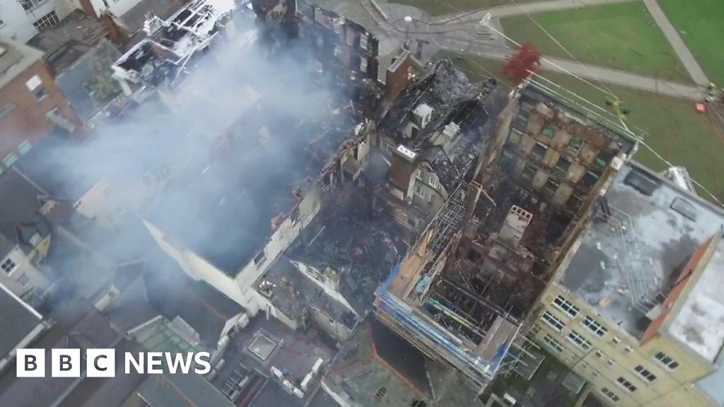Exeter fire: Drone footage shows smouldering hotel - BBC News