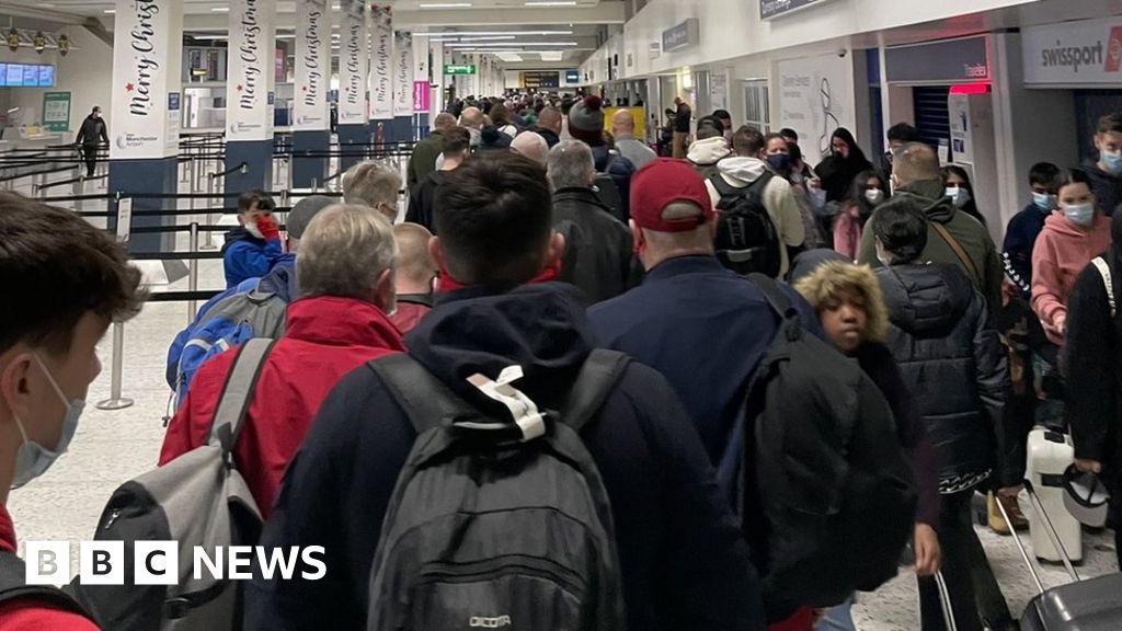 Manchester Airport queues 'a shambles' as flights missed - BBC News