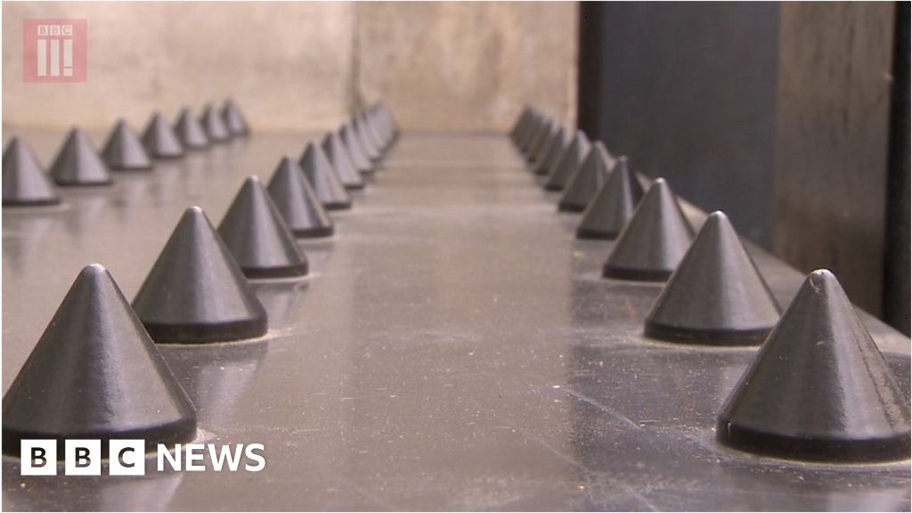 Manchester building's 'anti-homeless' spikes covered with cushions ...