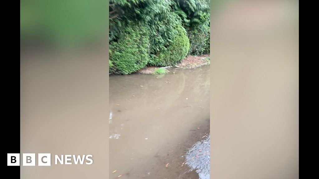 Flooding on residential street returns - BBC News