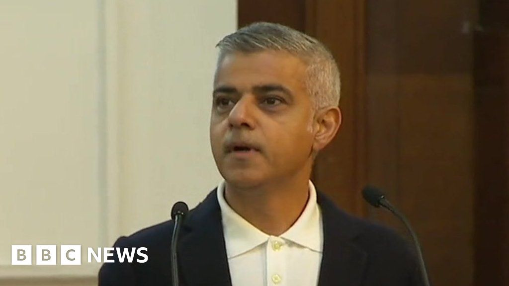 Mayor Sadiq Khan's speech interrupted by protesters - BBC News