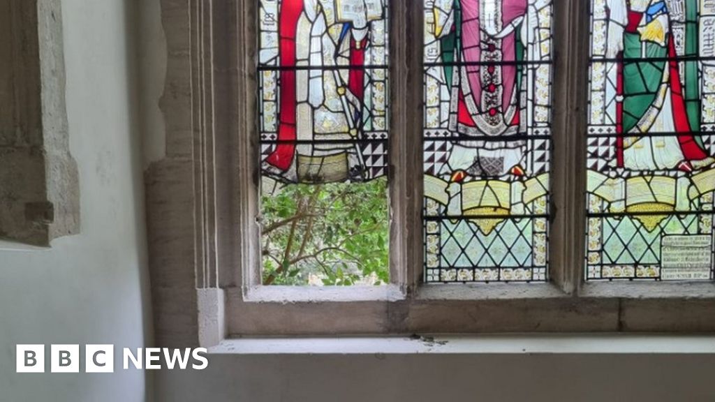Henley church's stained glass window smashed during break-in - BBC News