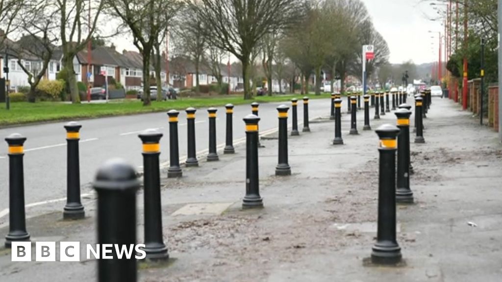 Birmingham council defends dozens of bollards on pavement - BBC News