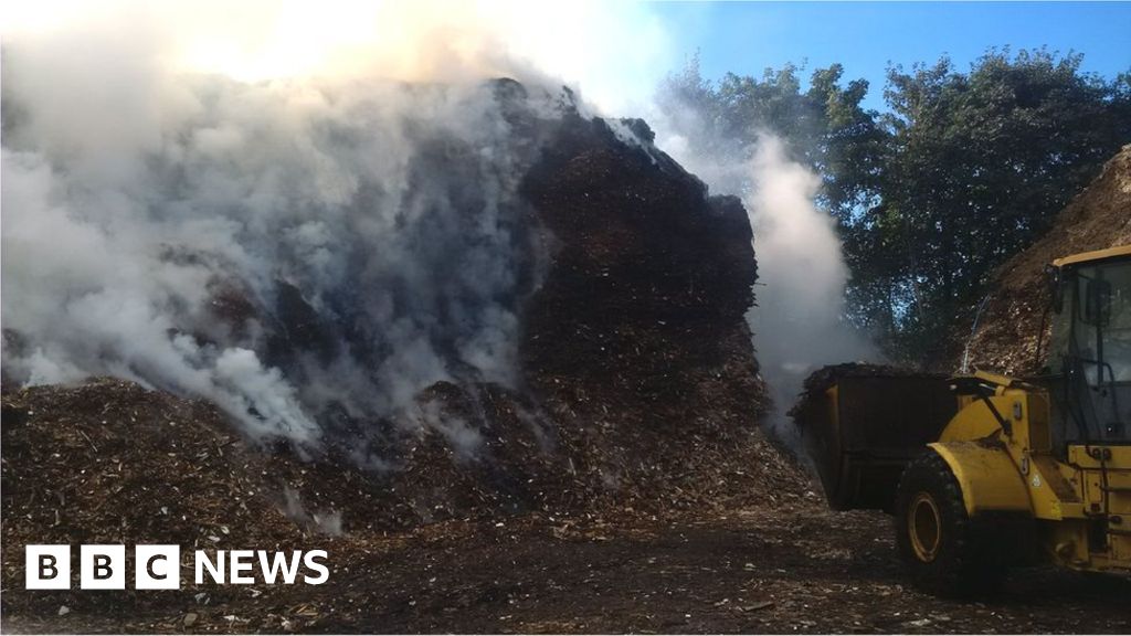 Coity woodchip fire at waste plant in Bridgend ongoing - BBC News