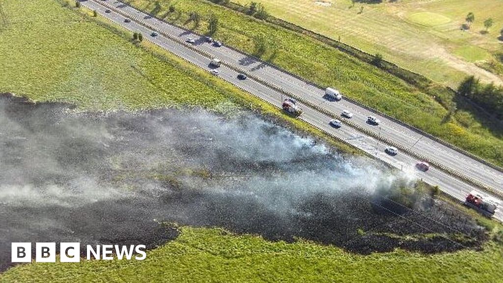 Haslingden A56 grass fire: Major road reopens after wildfire - BBC News