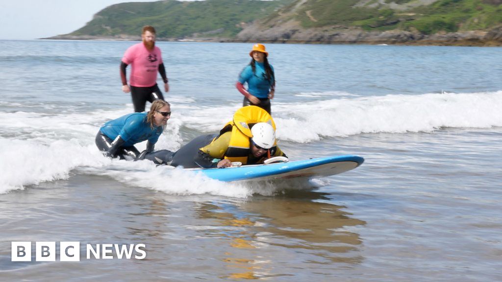 Surfing means 'everything' to brain injury survivors