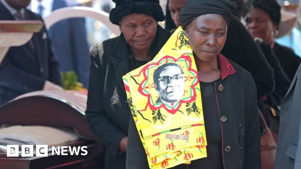 In pictures: Mourners in Zimbabwe view Robert Mugabe's body - BBC News