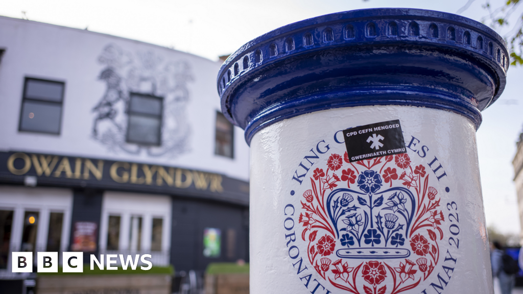 King Charles coronation: Cardiff postbox hit with stickers - BBC News