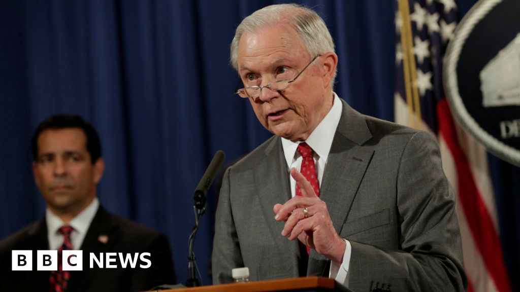 US attorney general says four charged in crackdown on leaks - BBC News