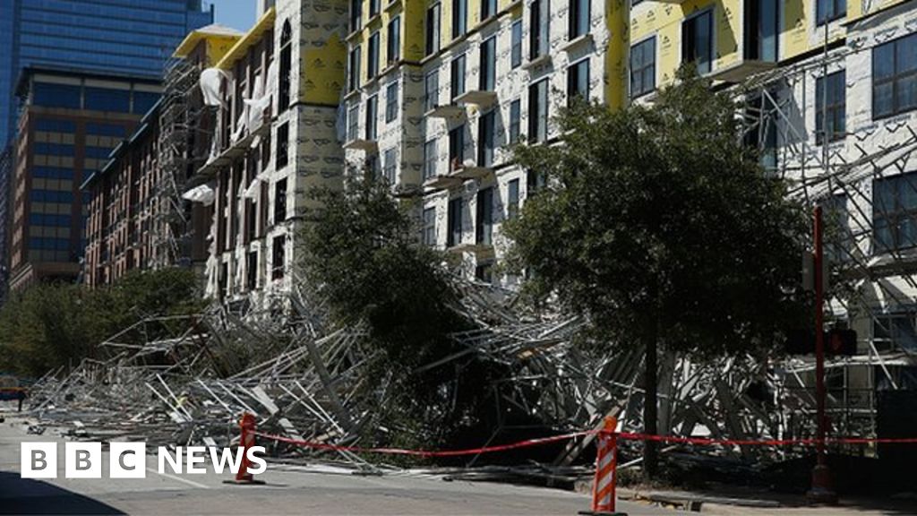 Scaffolding collapse traps construction workers in Houston - BBC News