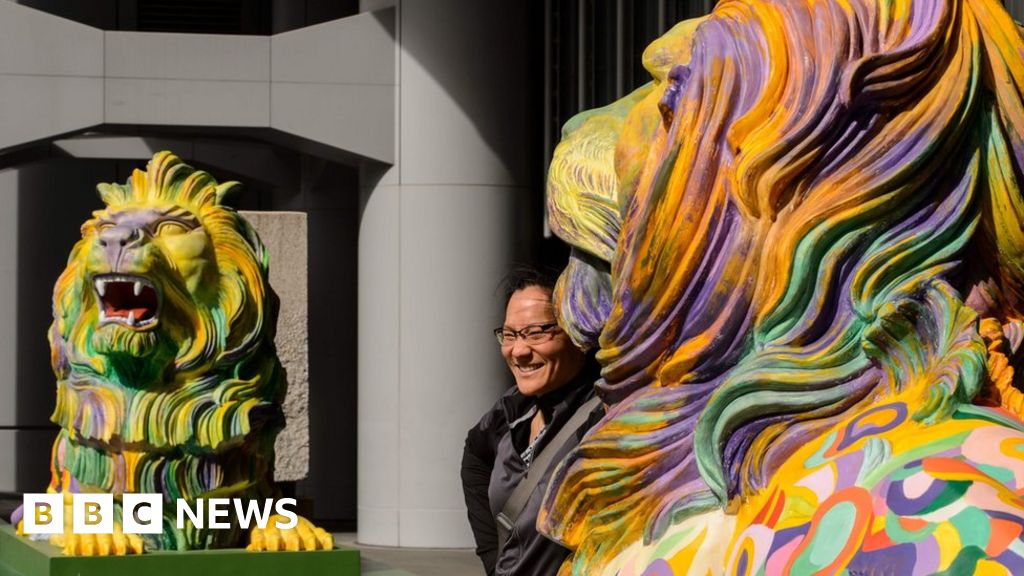Hong Kong rainbow lions spark LGBT rights debate - BBC News