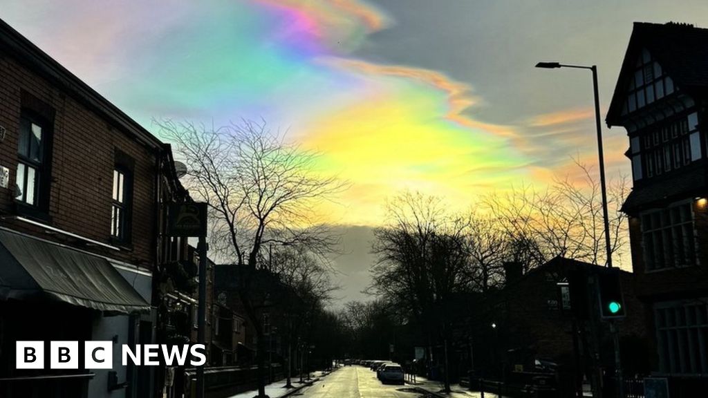 Rare 'rainbow cloud' dazzles skies across North West - BBC News