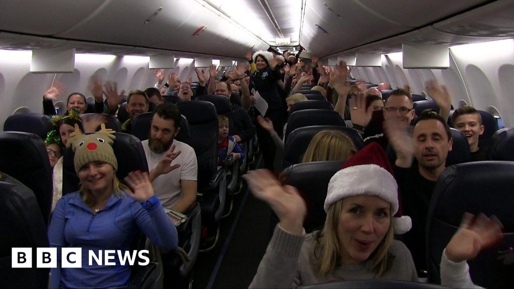 What's it like on an aeroplane on Christmas Day? - BBC News