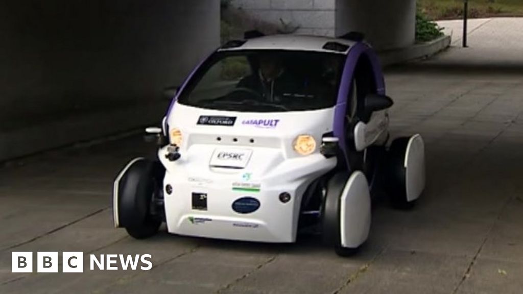 Driverless cars given first road test - BBC News