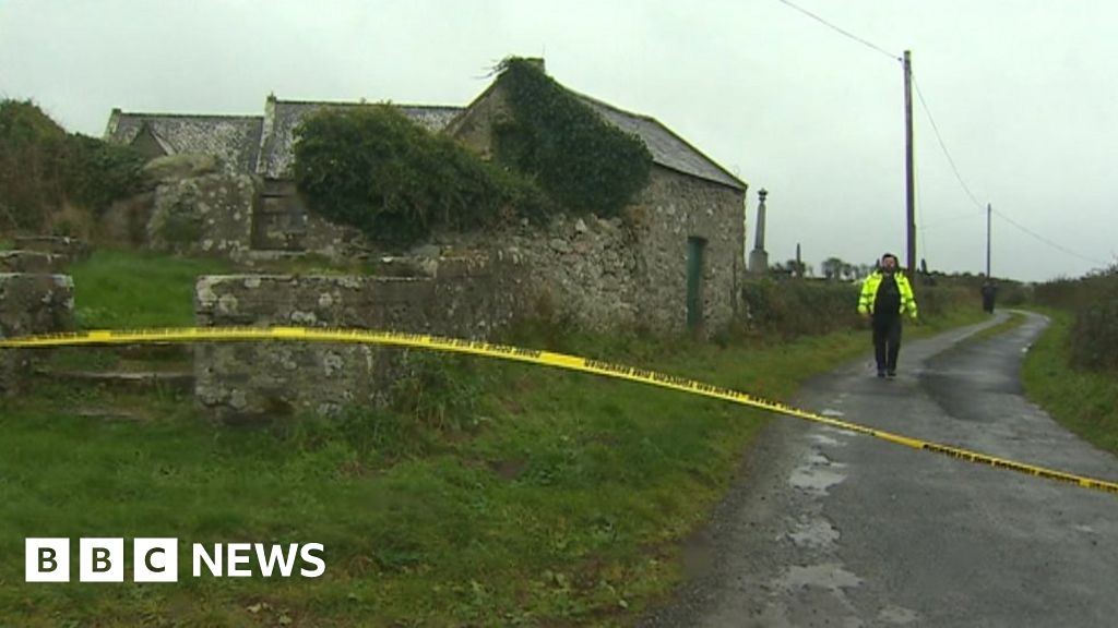 Unexploded military bomb found in Llanfwrog churchyard - BBC News