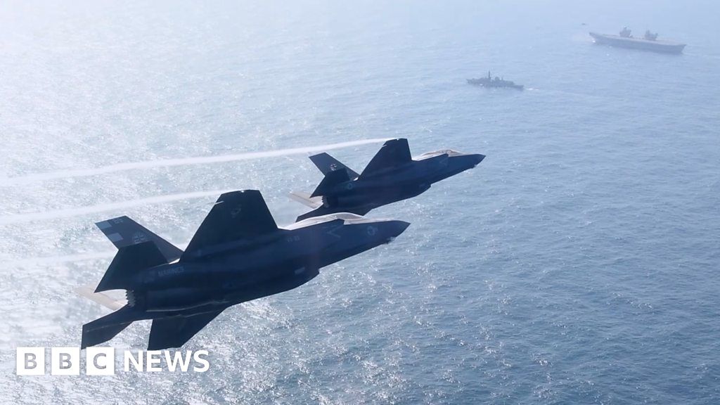 HMS Queen Elizabeth: Fighter jets land for first time - BBC News