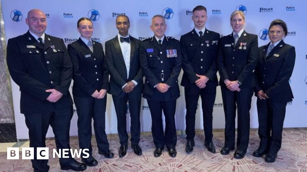 Five Lancashire PCs receive bravery awards for river rescue - BBC News