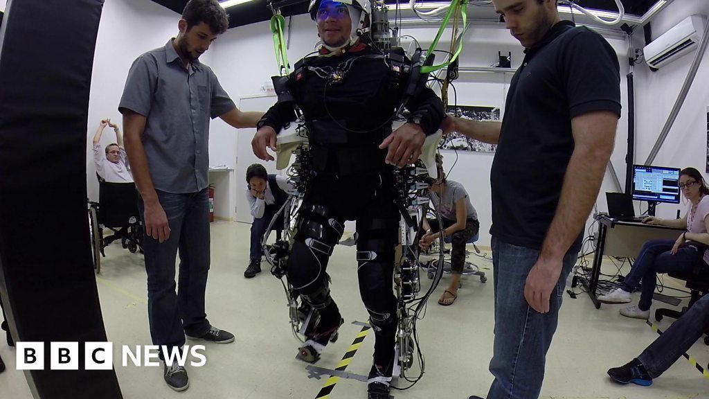 Learning to walk with robotic legs - BBC News
