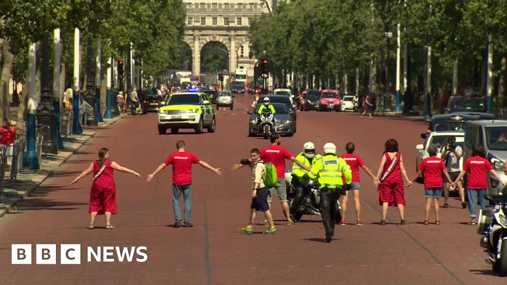 Environmental protesters attempt to block Boris Johnson's motorcade