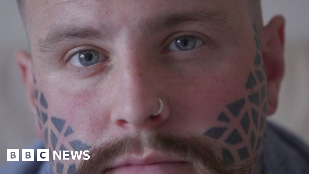 My life with a face tattoo - BBC News