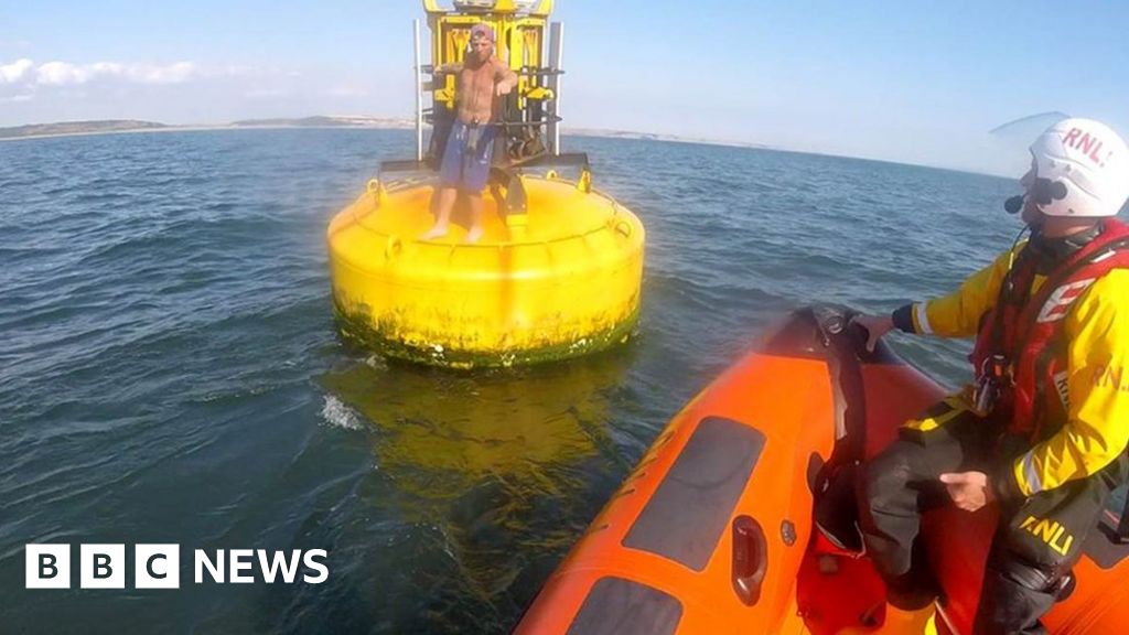 Buoy rescue for Porthcawl kayaker caught by tide - BBC News