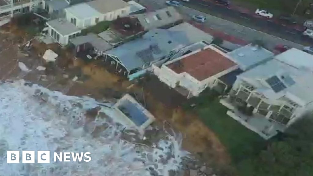 Australia storm aftermath reveals pool swept away - BBC News