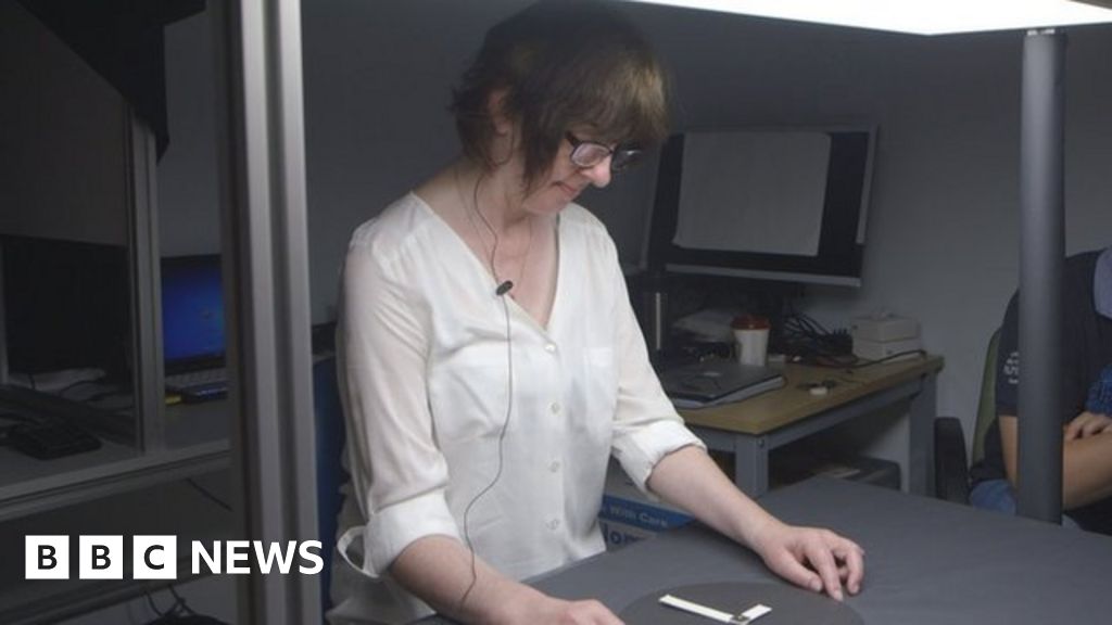 Blind Cardiff woman tests 'bionic' eye for the first time - BBC News