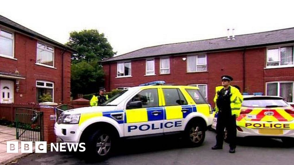 Man charged with murder after Rochdale house death