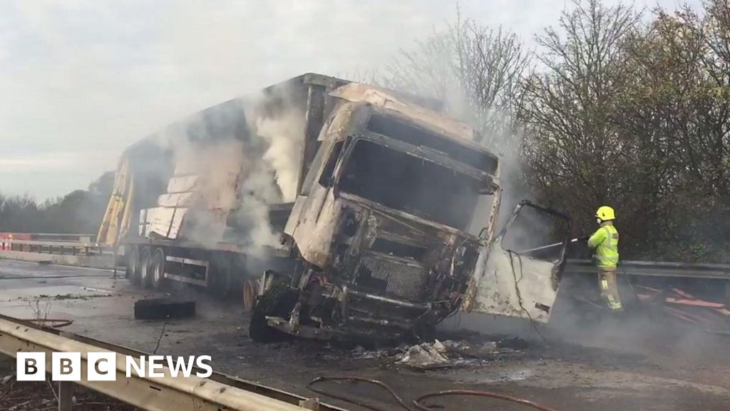 Lorry fire causes closure of A12 - BBC News