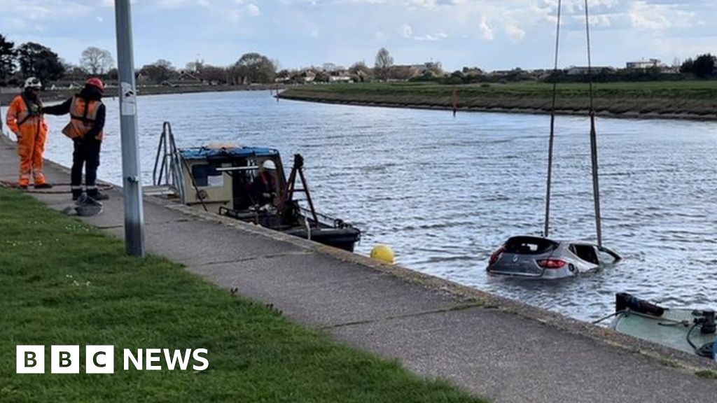 Recovery operation launched after car went into River Bure - BBC News