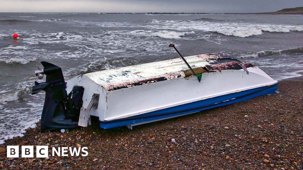 Two men rescued from sinking boat off Porthcawl coast - BBC News