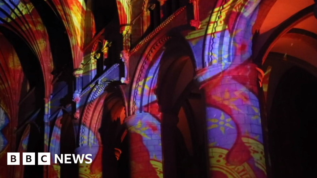 Art show lights up Gloucester Cathedral in stunning colours