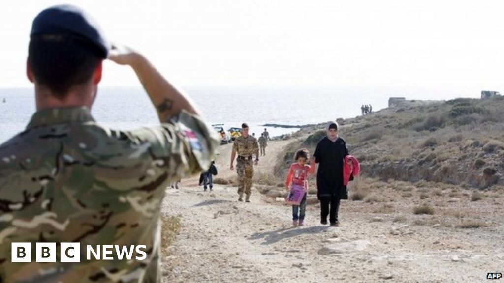 Migrant crisis: Boats land at UK base RAF Akrotiri in Cyprus - BBC News