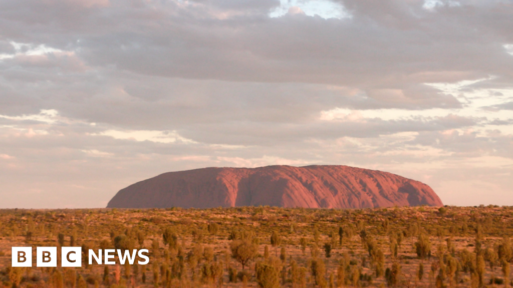 Banning the Uluru climb: 'This rock means everything to us' - BBC News