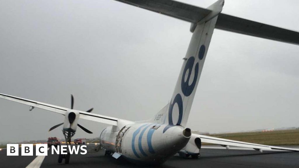 Plane evacuated after landing gear collapses - BBC News